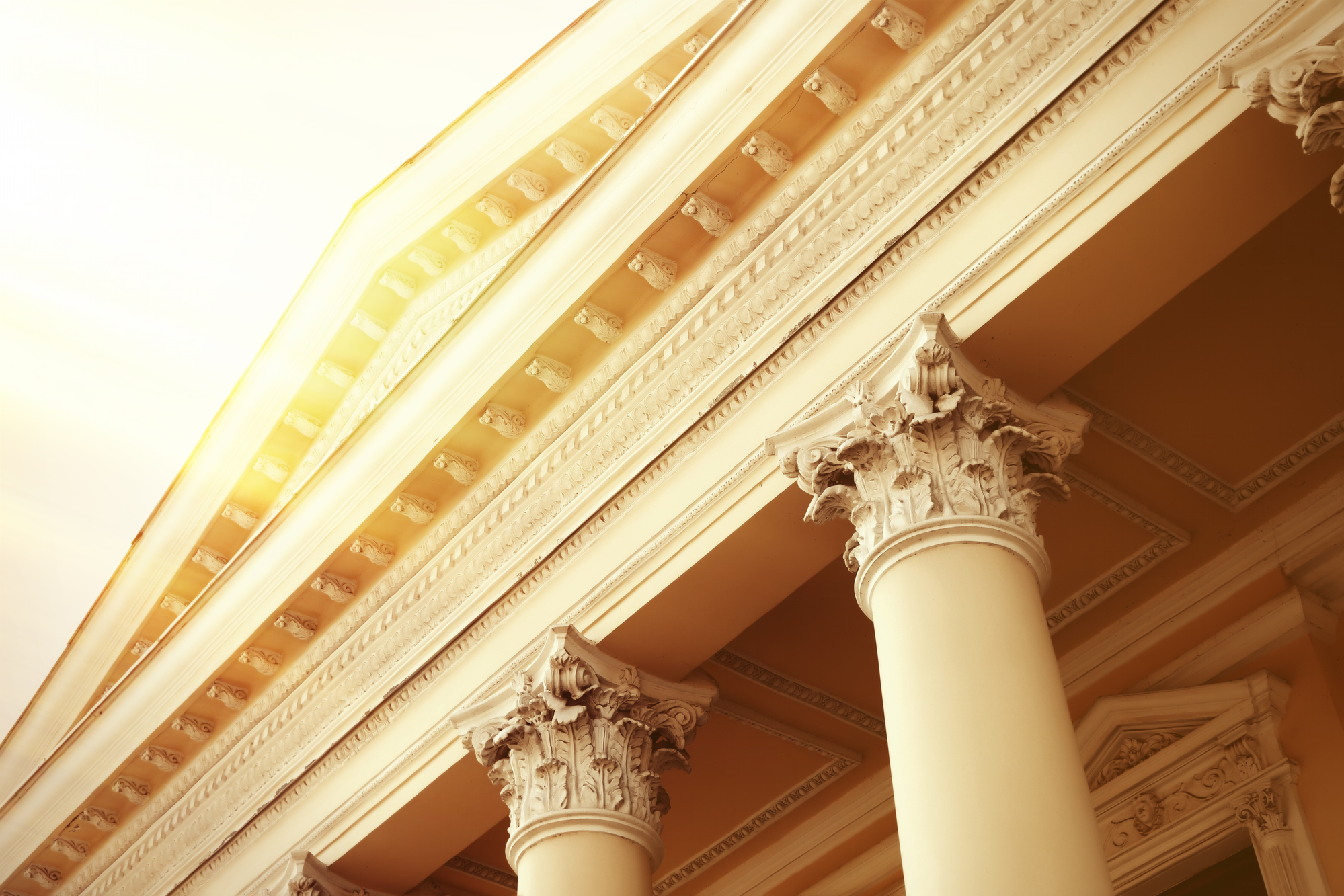 Pillars of courthouse in retro style - Amal Law Group, LLC